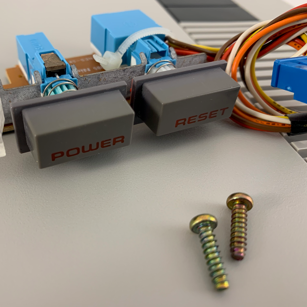 Original Nintendo NES Power and Reset Buttons